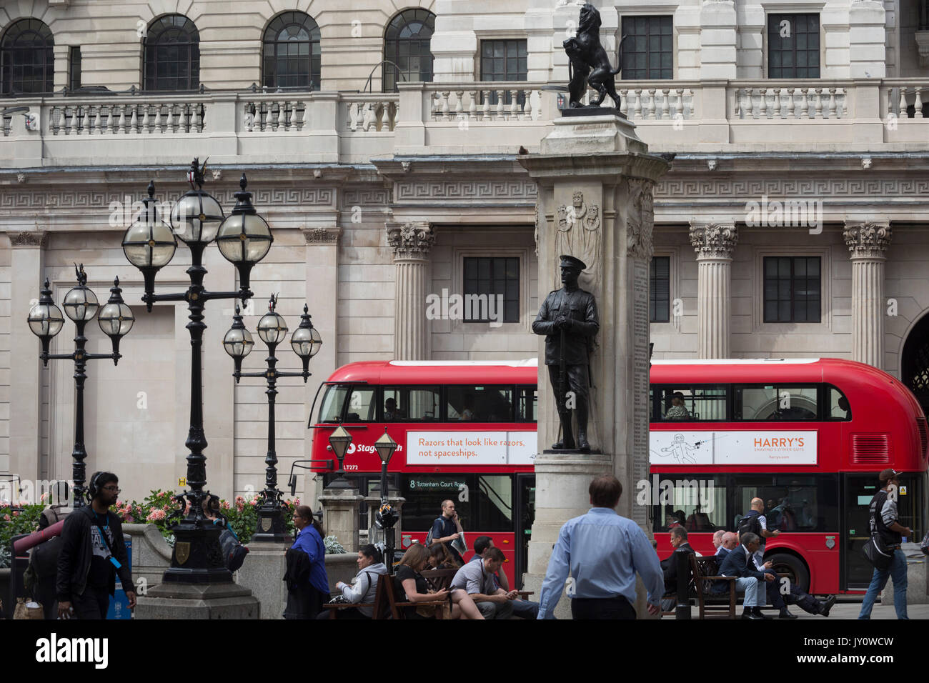 A London bus passes the WW1 war memorial opposite the Bank of England ...