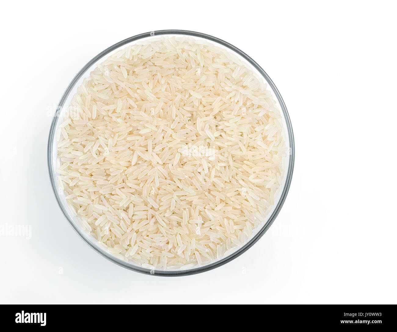 Healthy food. Parboiled rice in glass bowl isolated on white background ...