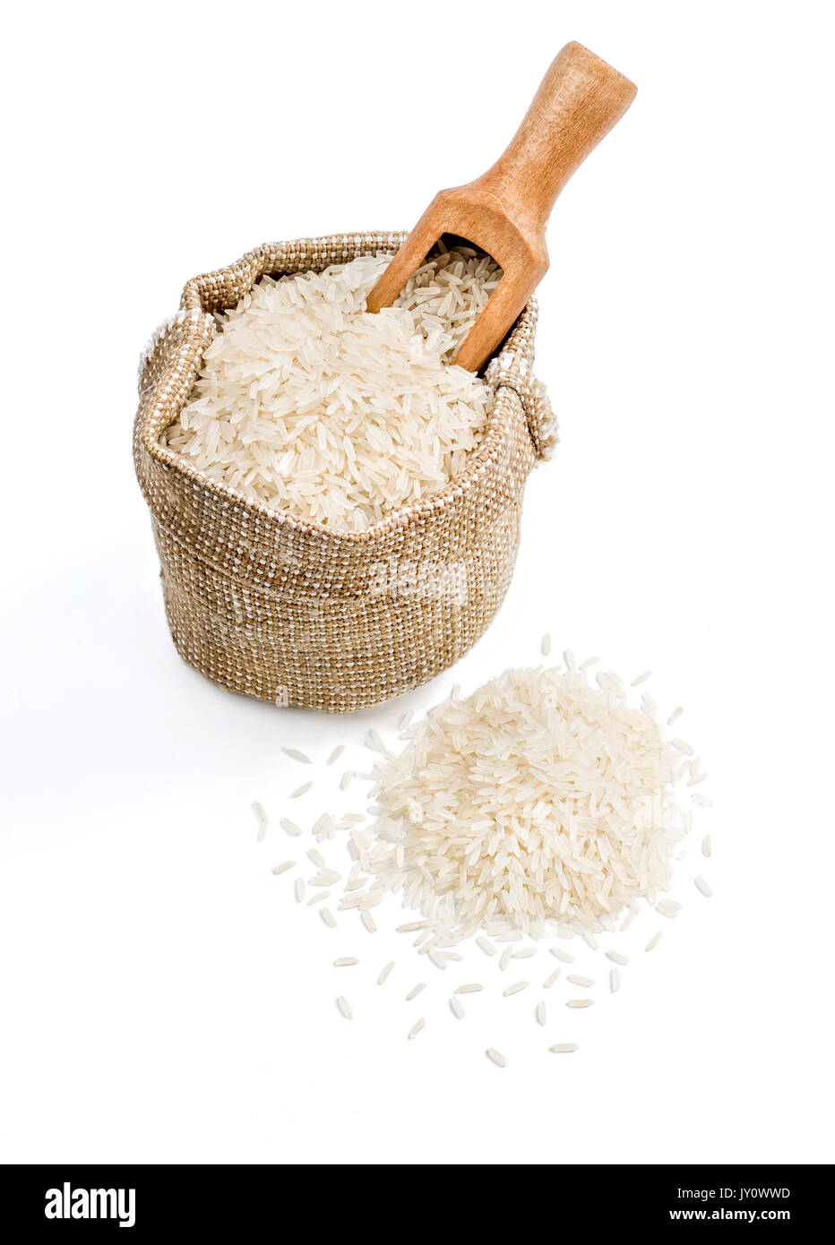 Burlap sack with parboiled rice and scoop isolated on white background ...