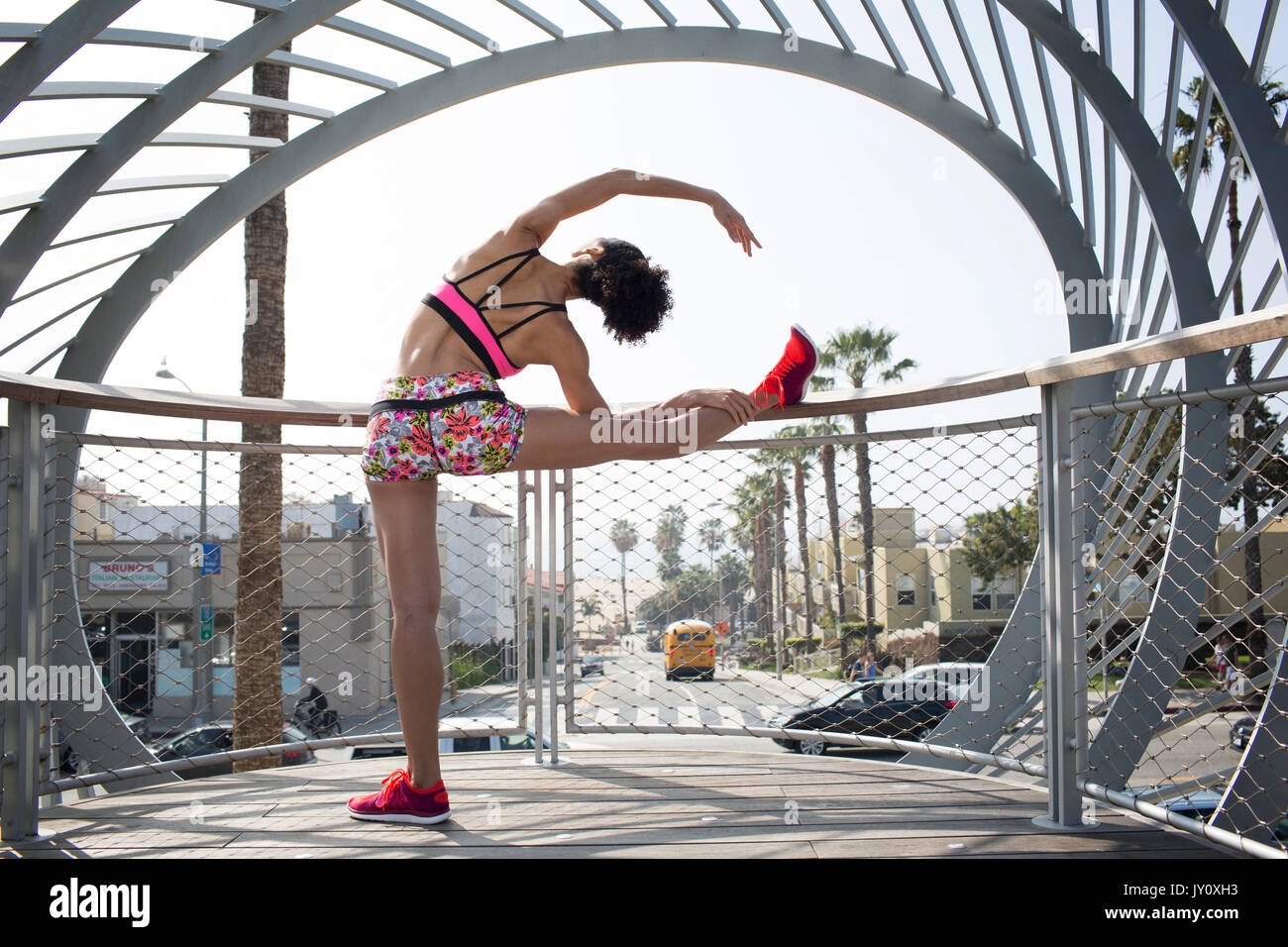 Fence stretching leg women hi-res stock photography and images - Alamy