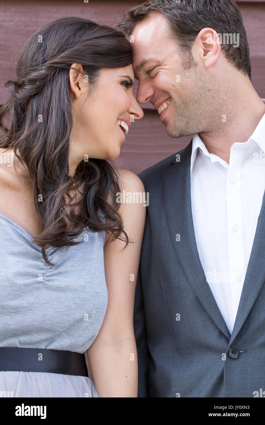 Two women touching forehead hi-res stock photography and images - Alamy