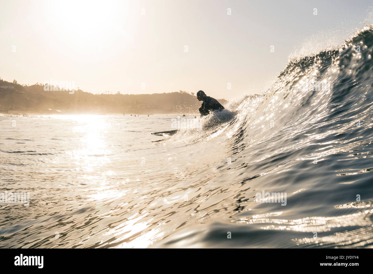 Man wet suit surfing wave hi-res stock photography and images - Alamy