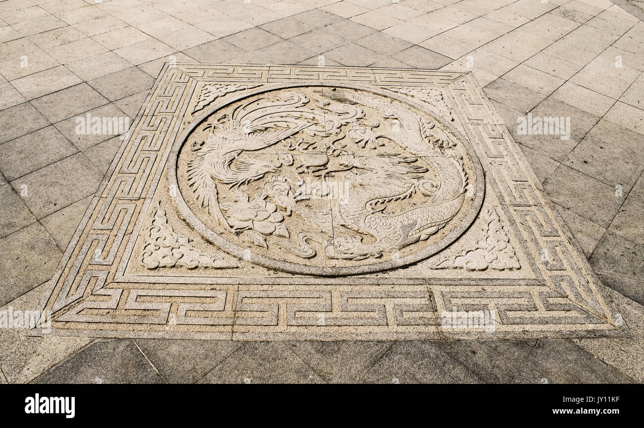 Tiles featuring a Chinese Pattern with dragons Stock Photo - Alamy
