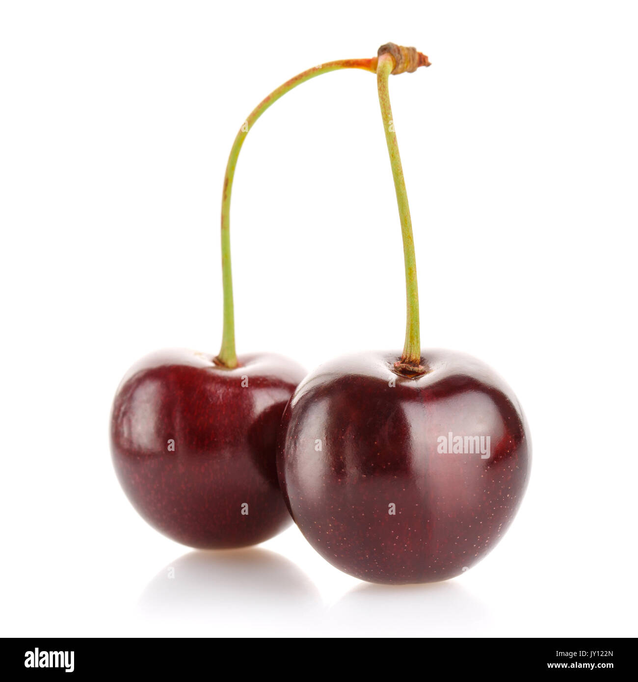 Juicy ripe cherry isolated on white Stock Photo - Alamy