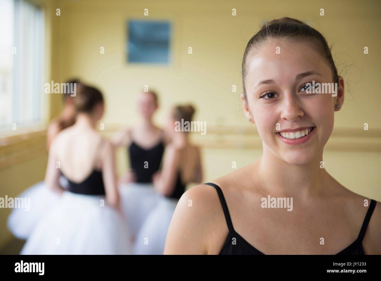 Portrait of girl smiling in ballet studio Stock Photo - Alamy
