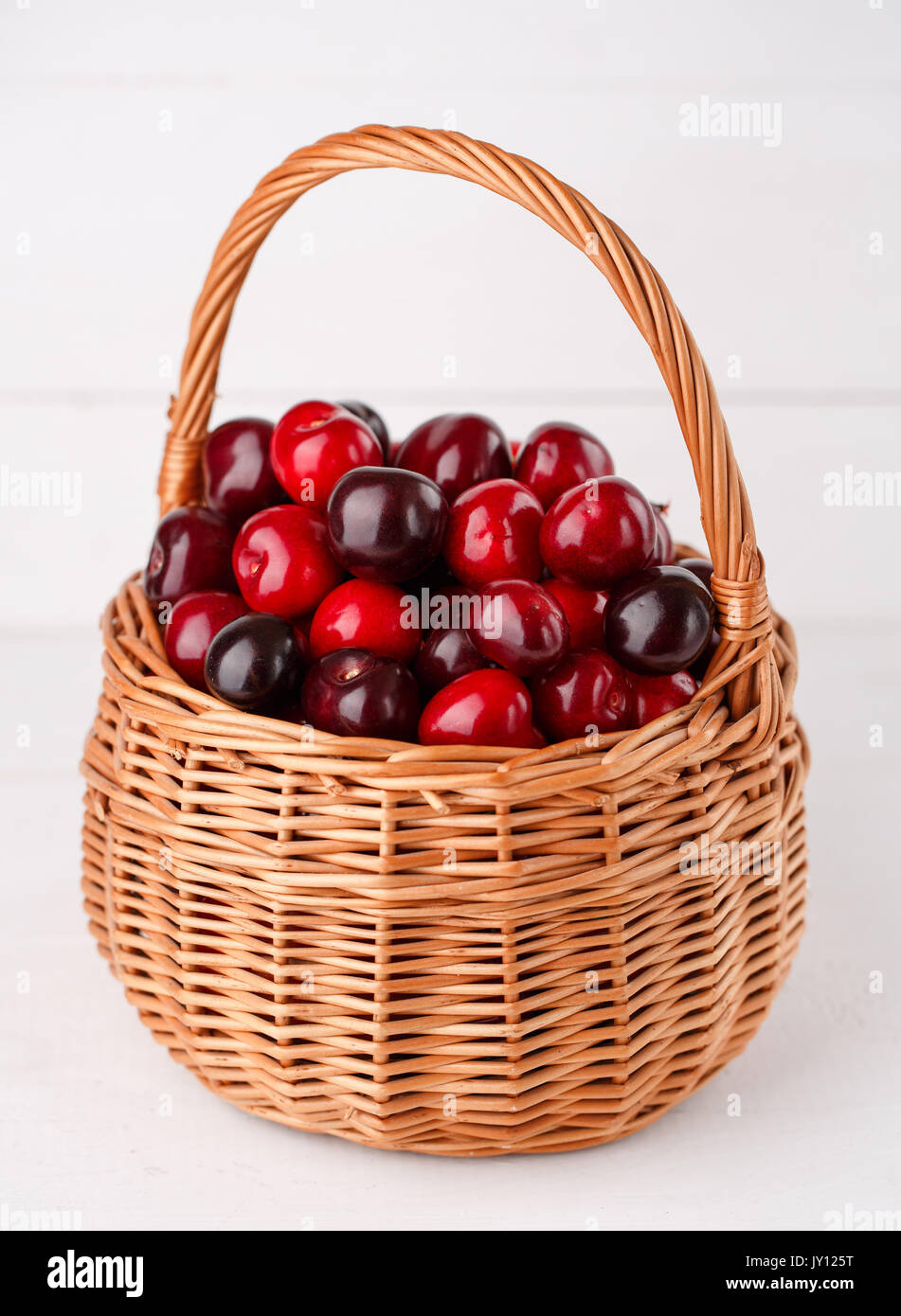 Sweet basket raw cherries hi-res stock photography and images - Alamy