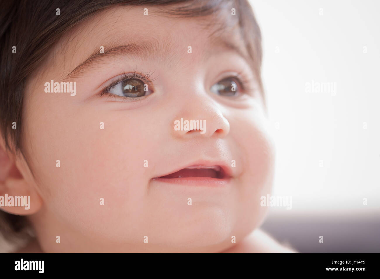 Portrait of smiling Hispanic baby boy Stock Photo - Alamy