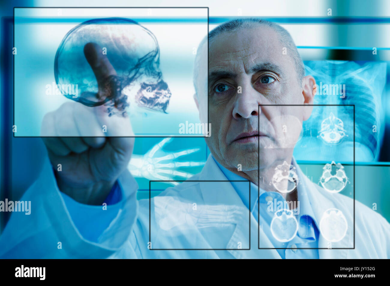 Hispanic doctor using virtual computer screen Stock Photo - Alamy