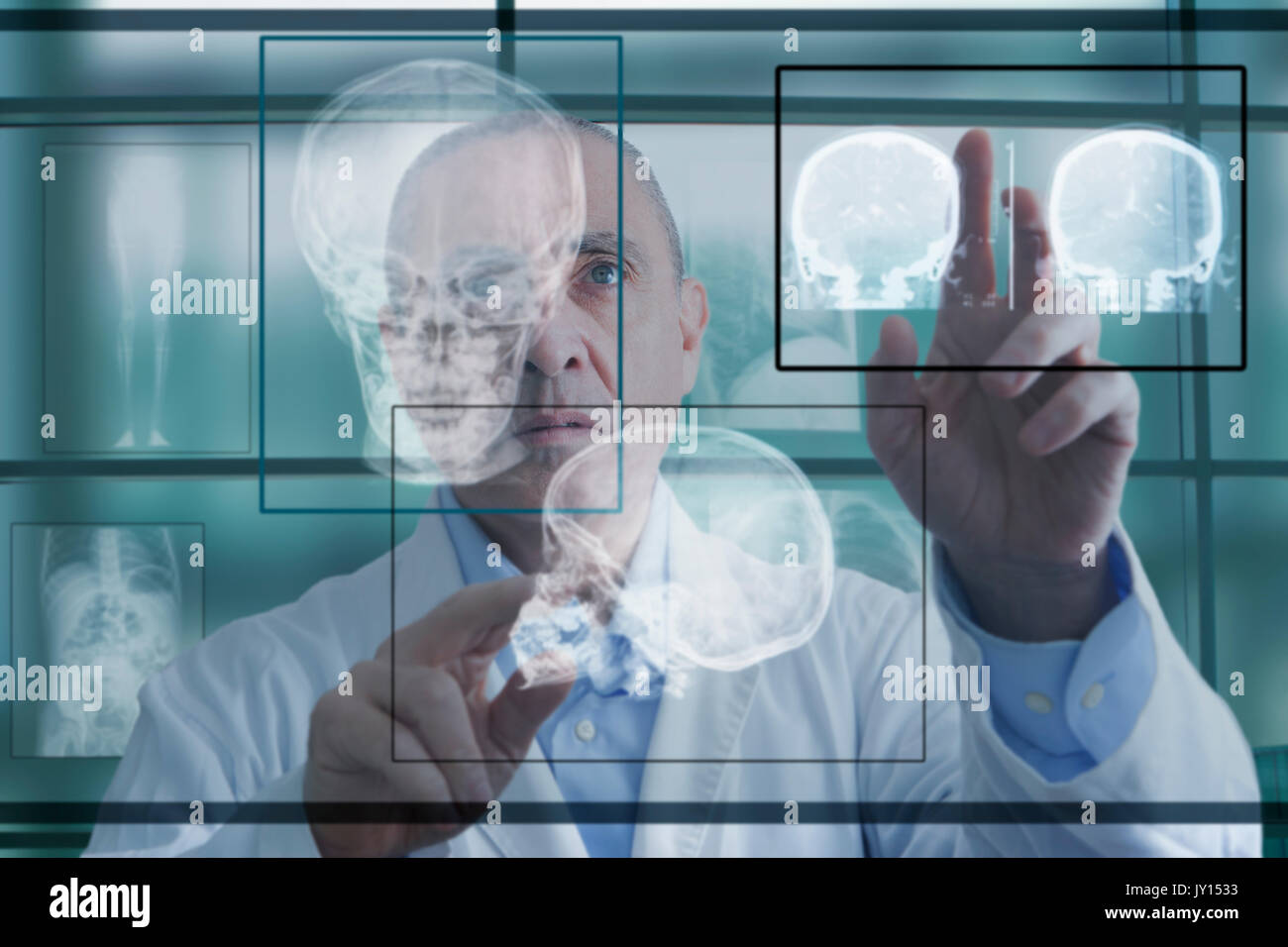 Hispanic doctor using virtual computer screen Stock Photo - Alamy