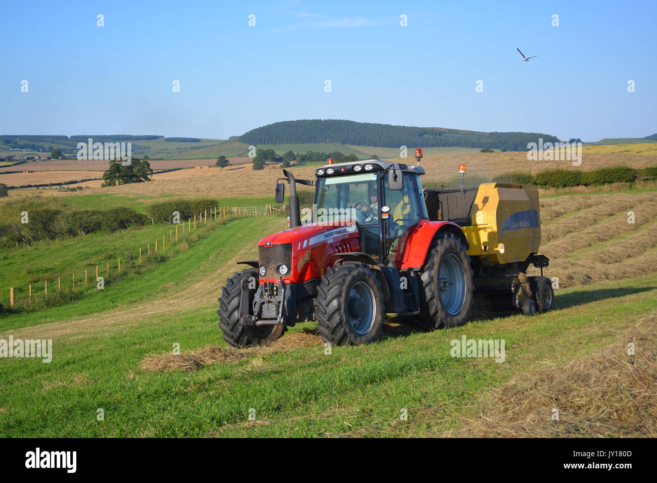 Massey Ferguson MF6480 with baler Stock Photo - Alamy