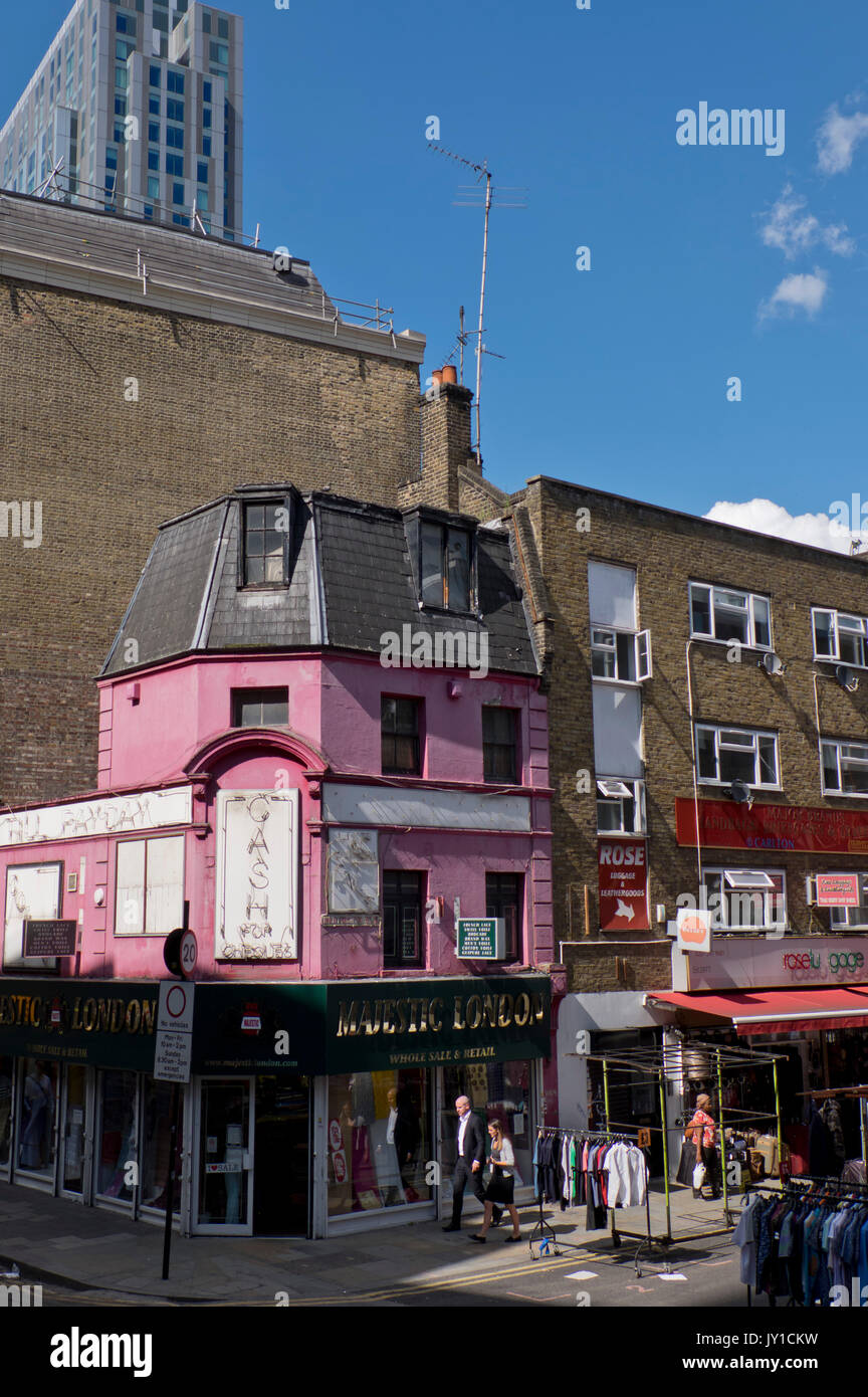 Old shops on Petticoat Lane market in Whitechapel, with new luxury ...