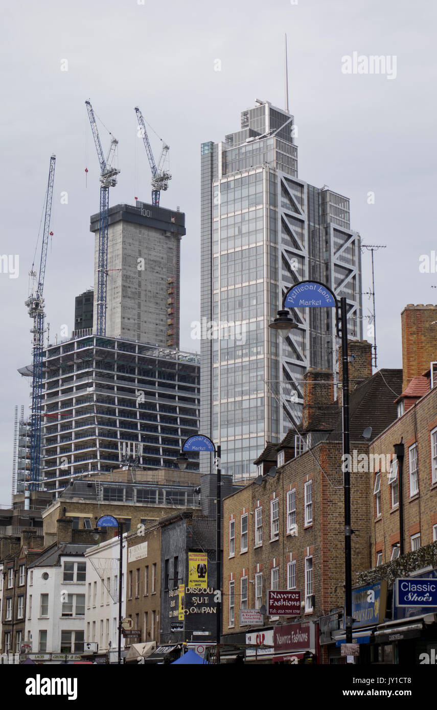 Old shops on Petticoat Lane market in Whitechapel, with new luxury ...