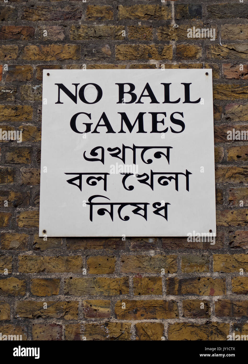 Bilingual Englsih and Bengali sign in old social housing estate near ...