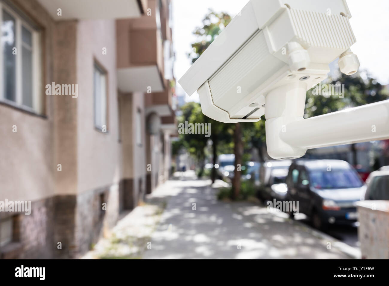 Close-up Of Security Camera On The Footpath Of Building Stock Photo - Alamy