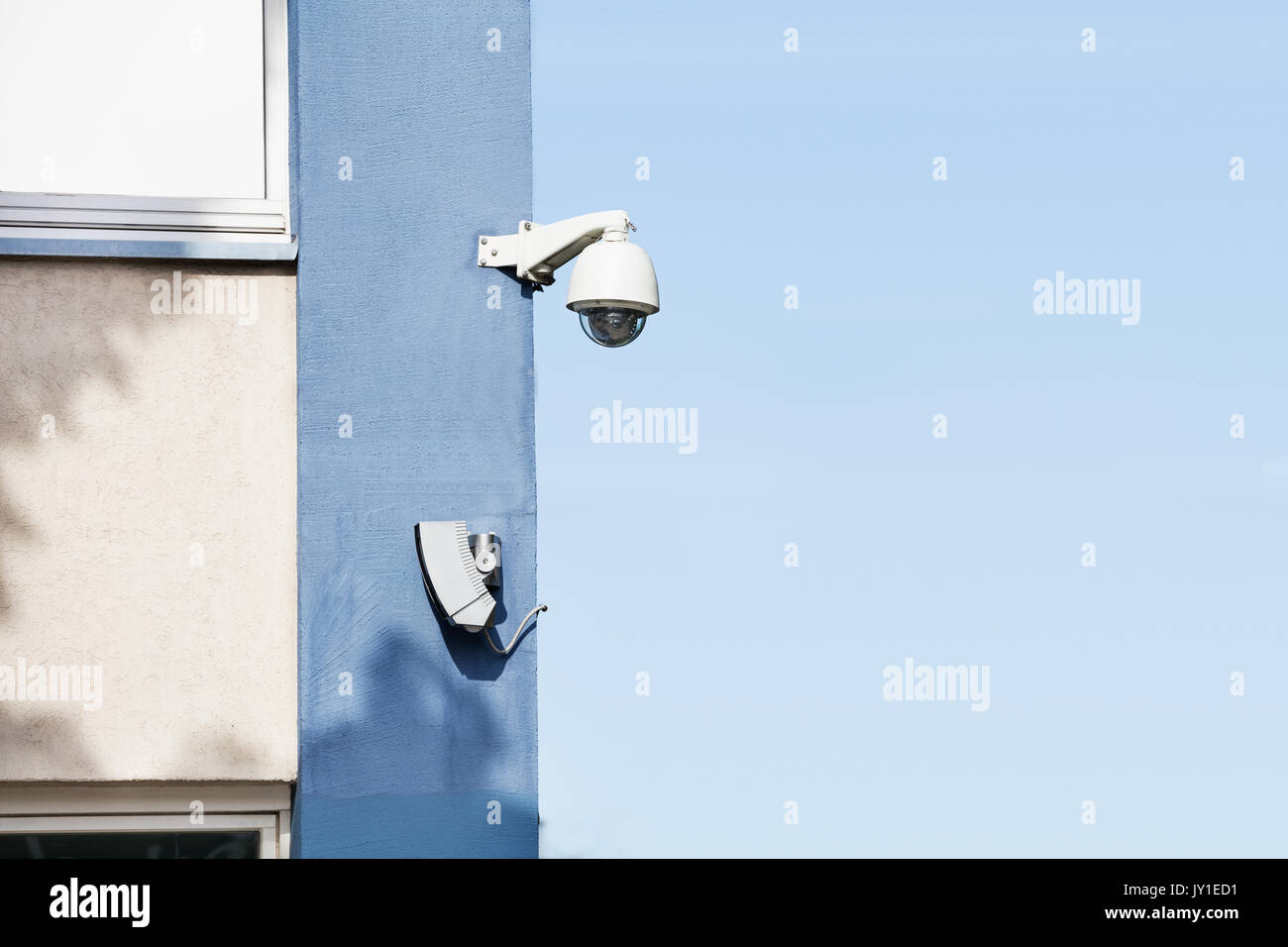 Close-up Of Security Camera Installed On The Wall Of The Building Stock ...