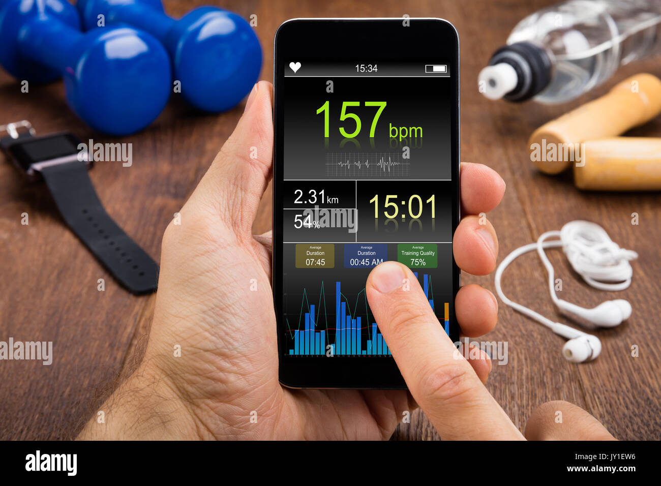 Close-up Of Person Checking Heart Rate Application On Mobilephone At ...
