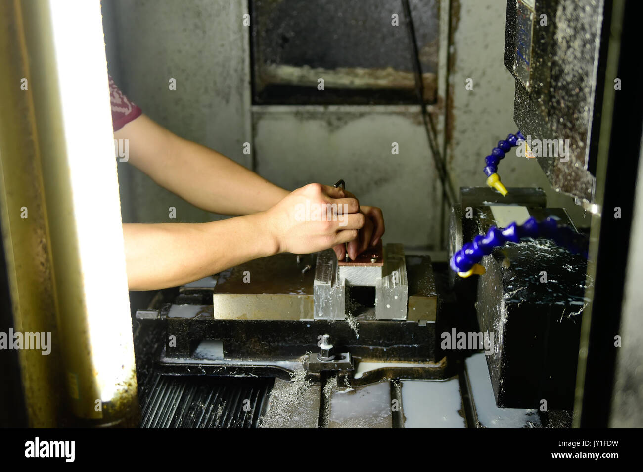Factory worker setting up cnc hi-res stock photography and images - Alamy