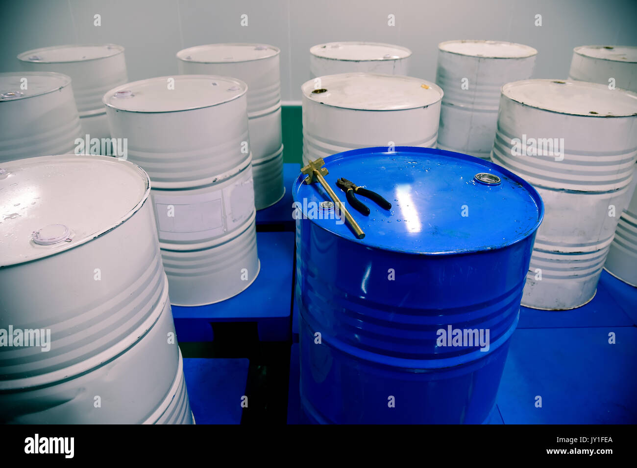 Group of barrels with chemistry at factory workshop Stock Photo - Alamy
