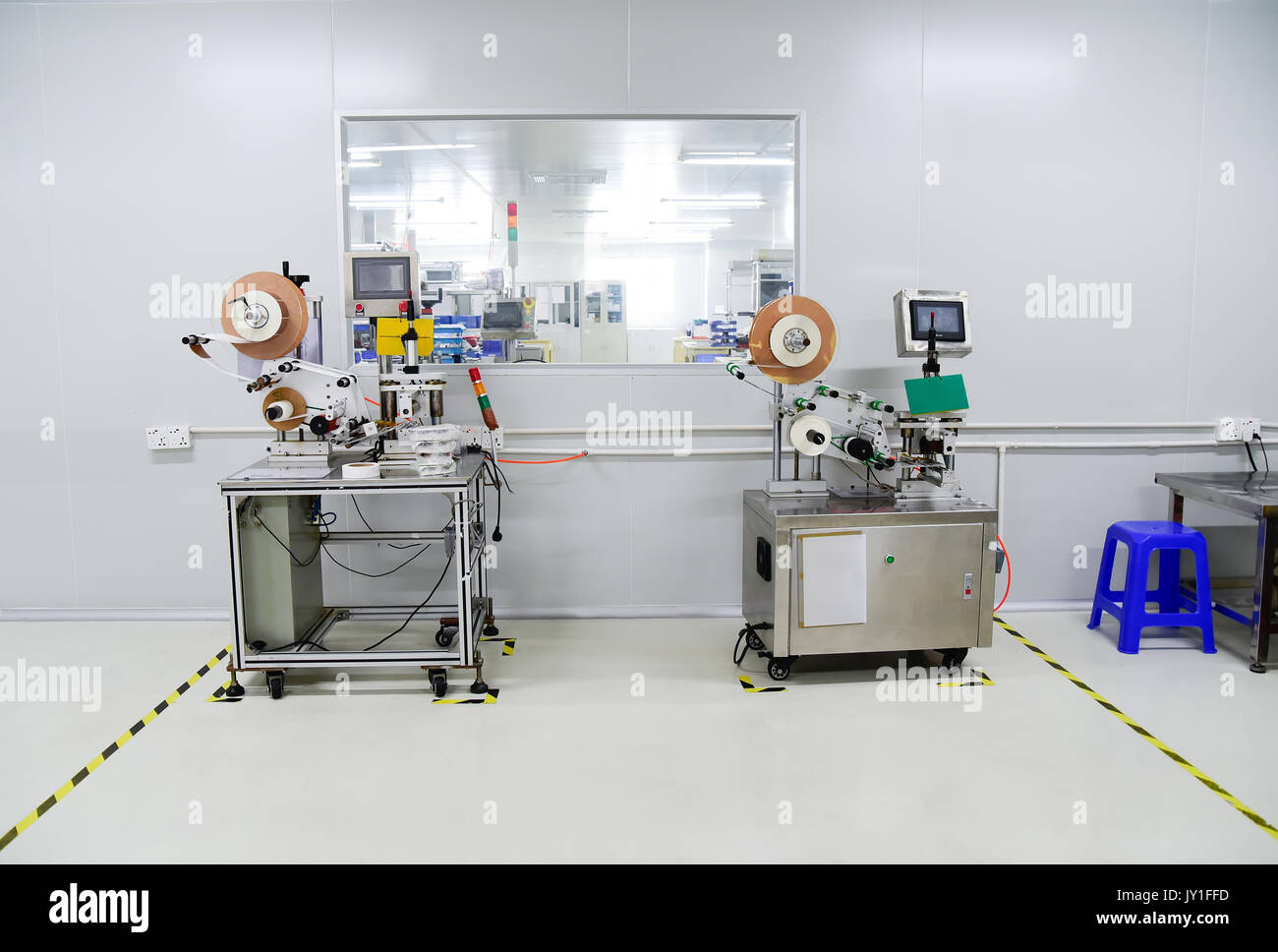 Clean and modern labeling workshop at factory Stock Photo - Alamy