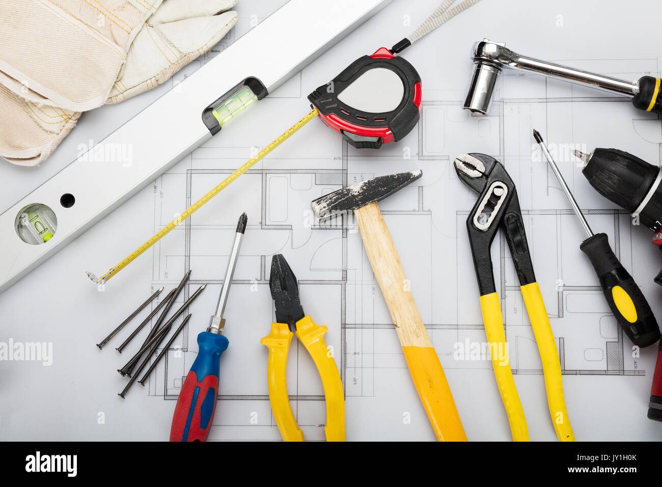 High Angle View Of Working Tools On Blueprint On Office Desk Stock ...