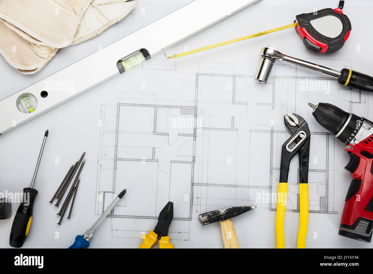 High Angle View Of Tools And Equipment Are Placed On Blueprint In ...