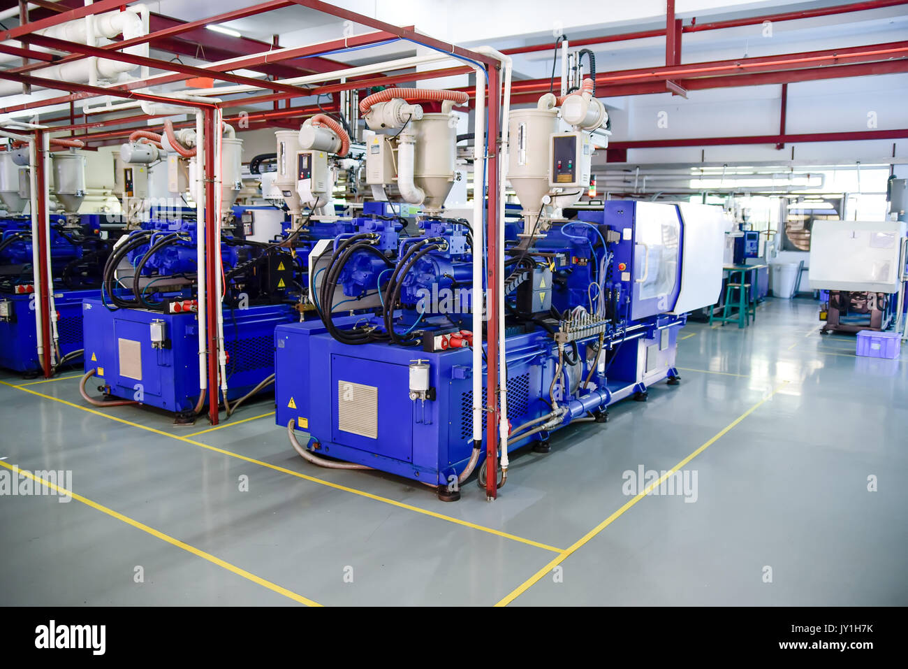 Factory injection moulding machines hi-res stock photography and images ...