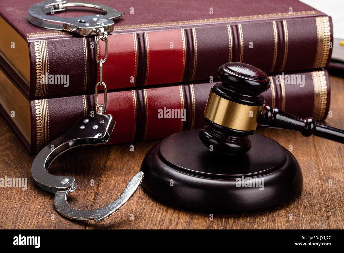 Golden handcuffs hi-res stock photography and images - Alamy
