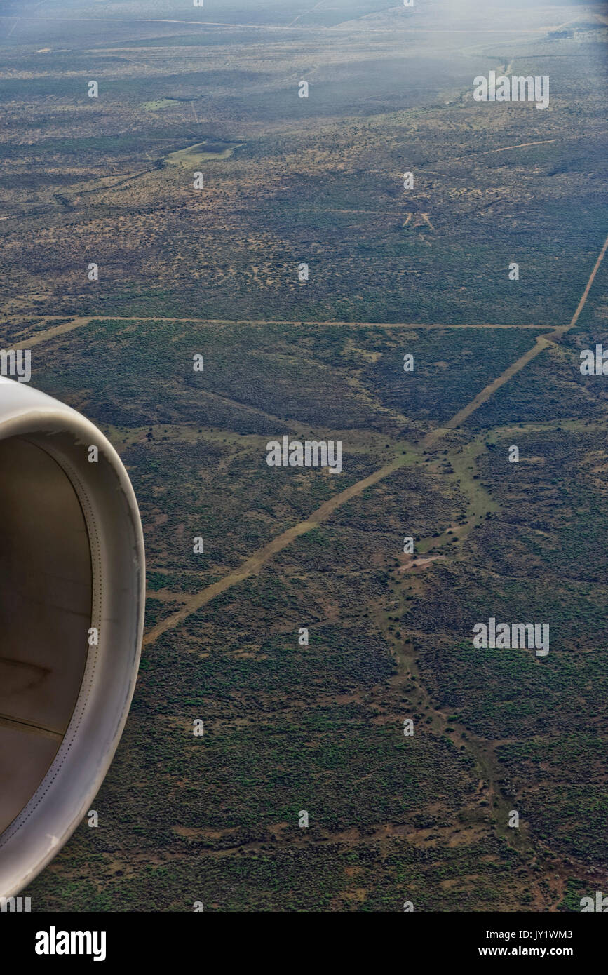 Landing approach to Windhoek, view on farmland through an airplane ...