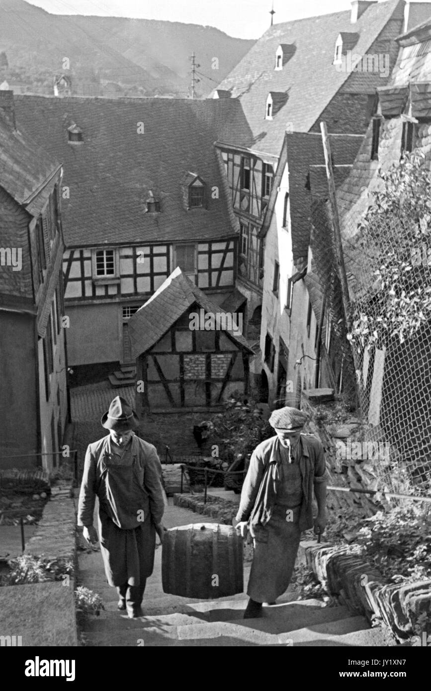 Carrying Barrel High Resolution Stock Photography and Images - Alamy