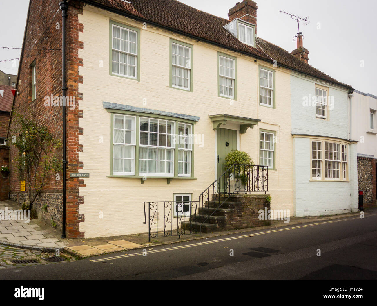 Street view of some Georgian terraced houses in the UK Stock Photo - Alamy