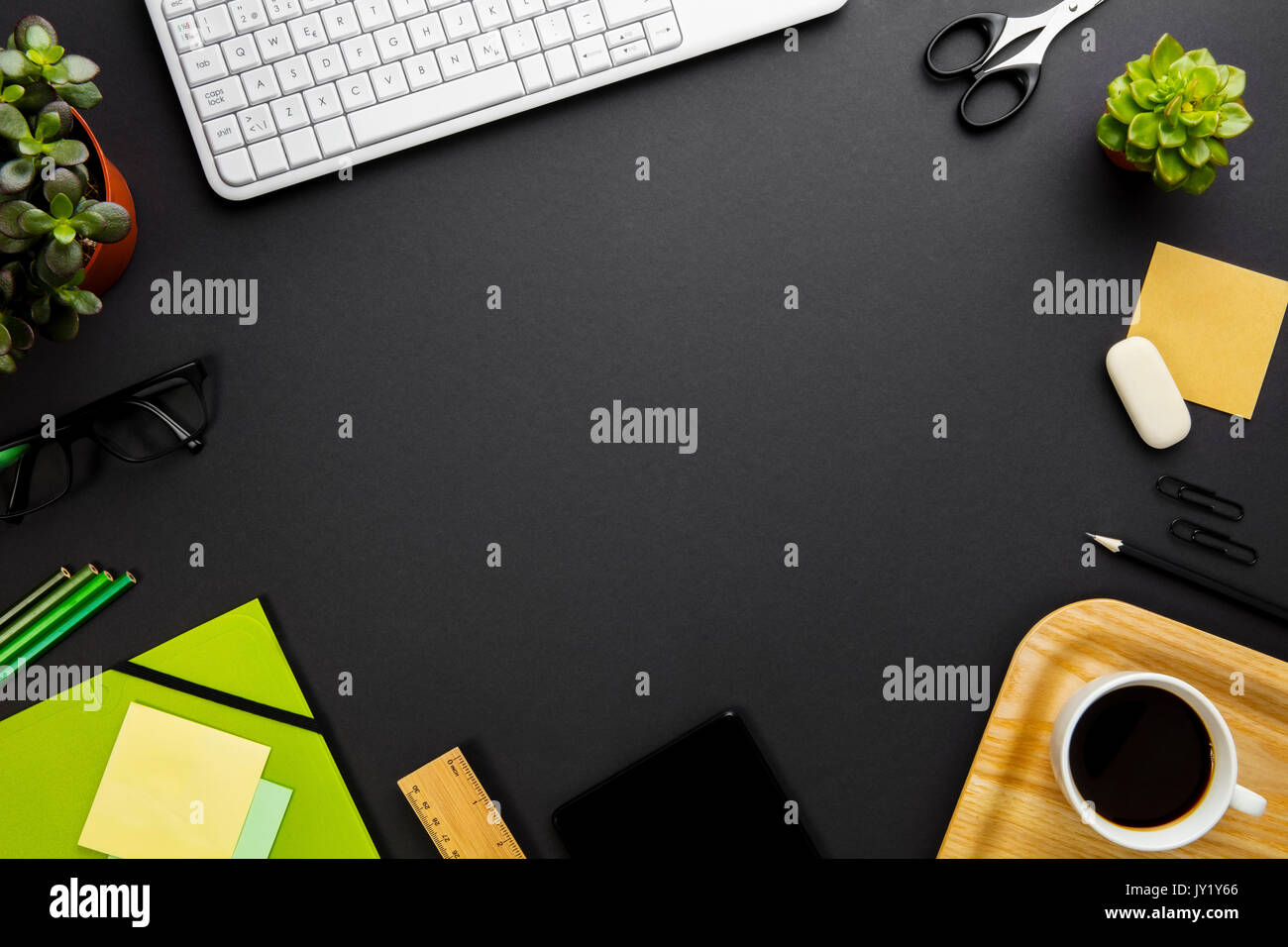 Office Supplies And Keyboard Arranged On Gray Desk Stock Photo - Alamy