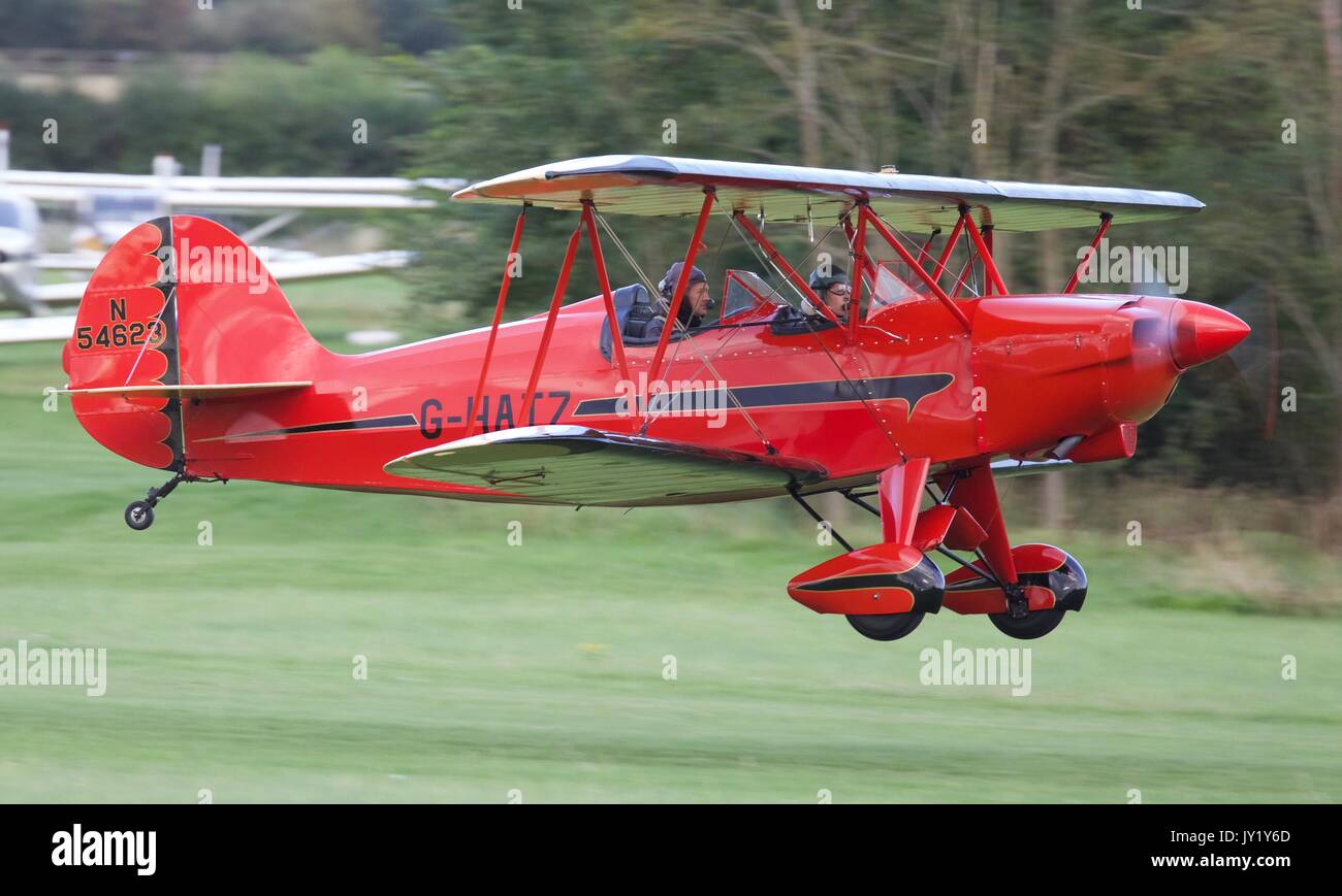 Hatz CB-1 biplane taking off from Old Warden Aerodrome Stock Photo - Alamy