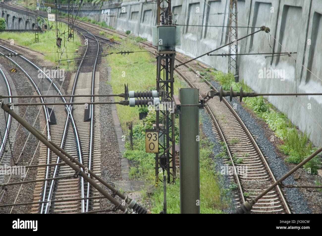 supply lines over railway tracks Stock Photo - Alamy