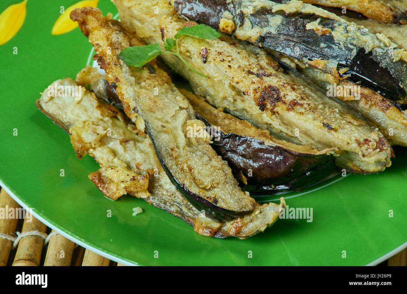 Beguni - Bengali snack made of eggplant, sliced and battered before ...