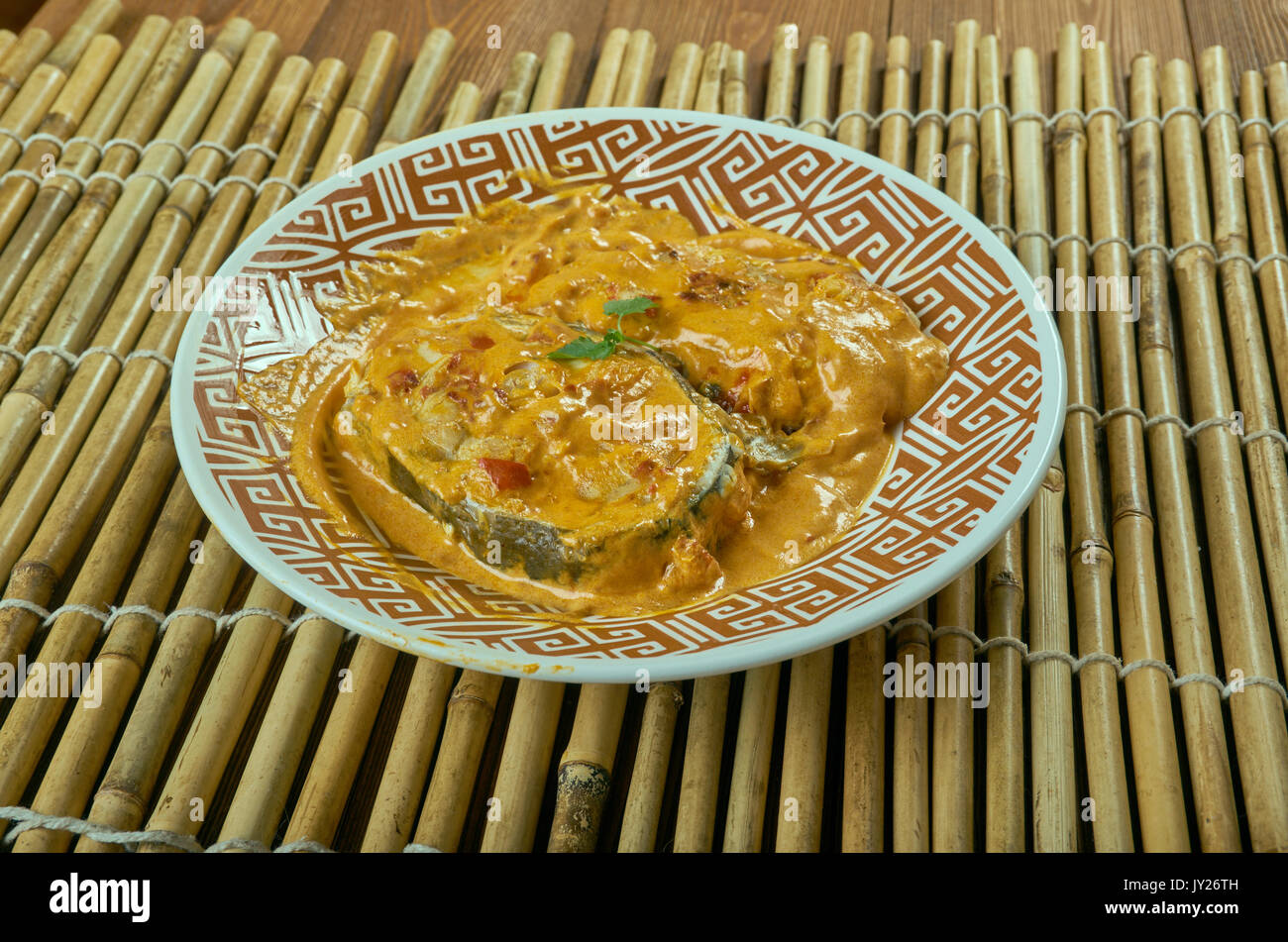 Bengali mustard fish Curry. Fish cooked with masala in mustard oil ...