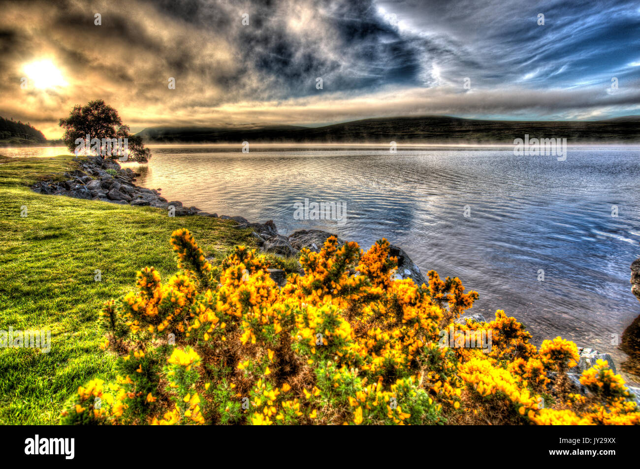 Area of Altnaharra, Scotland. Picturesque silhouetted sunrise view of ...