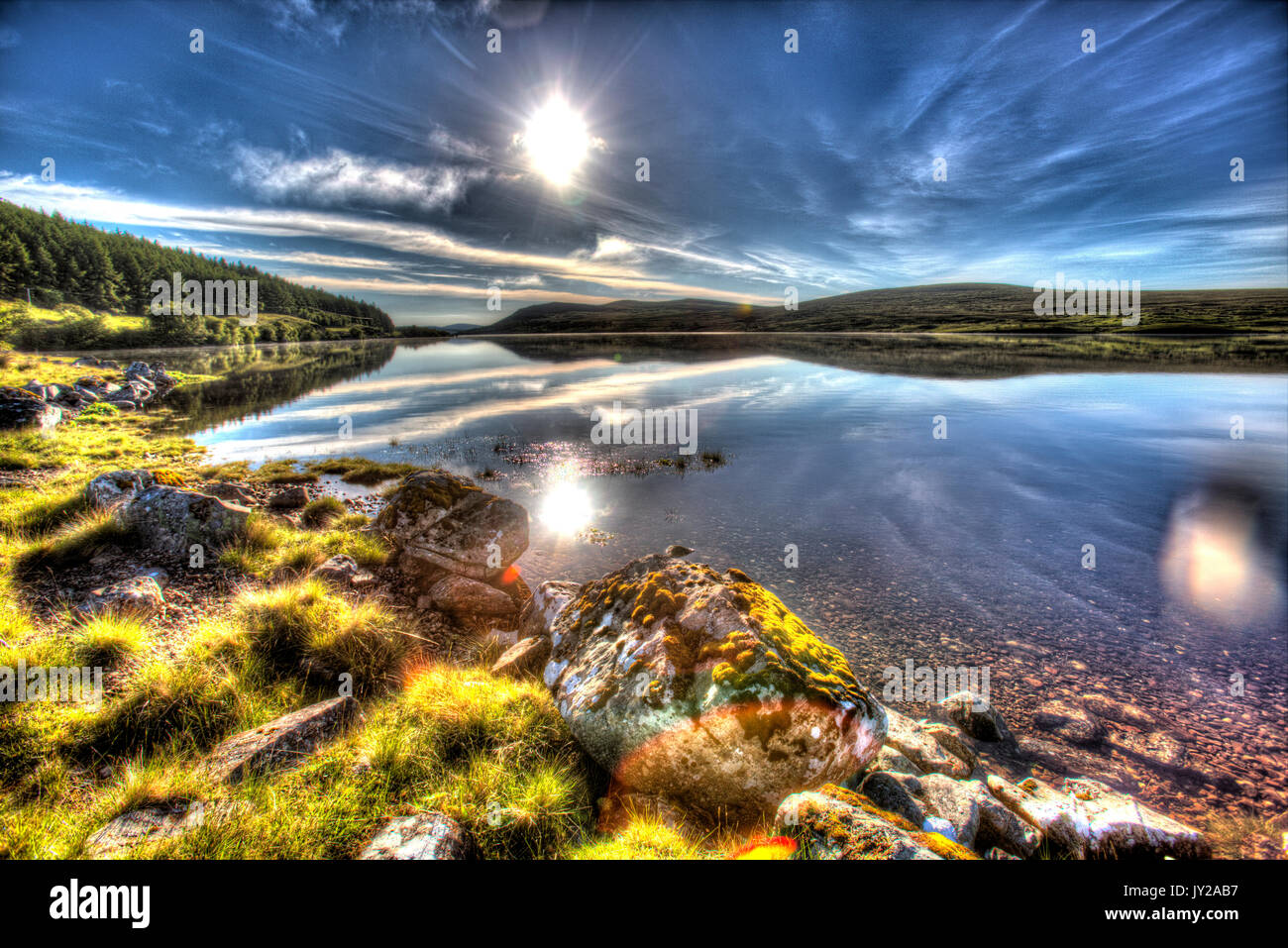 Area of Altnaharra, Scotland. Picturesque silhouetted sunrise view of ...