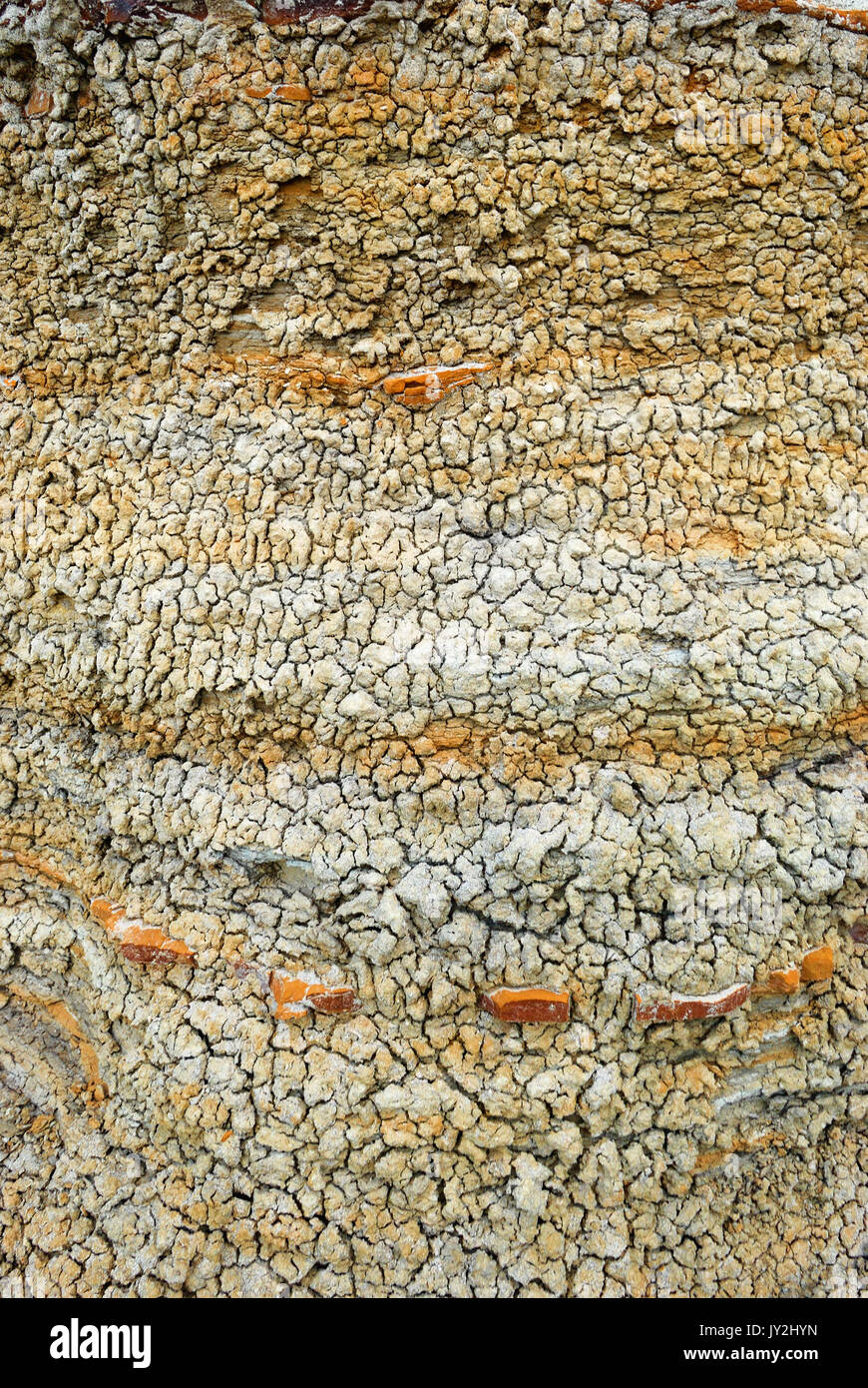 Grungy background texture of betonite clay hill in Alberta Badlands ...