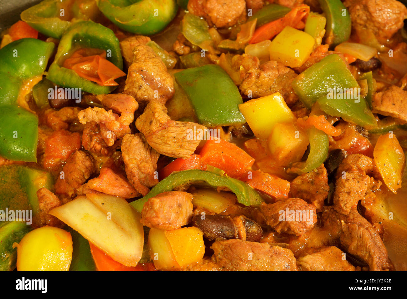 Chicken and Vegetable stir fry fast food cooking in wok Stock Photo - Alamy