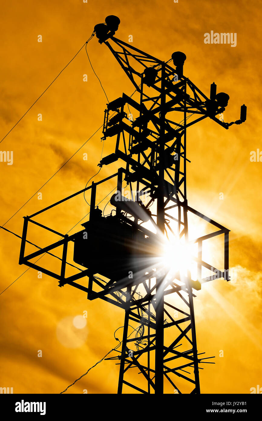 an image of a metal tower of Power Lines Stock Photo - Alamy