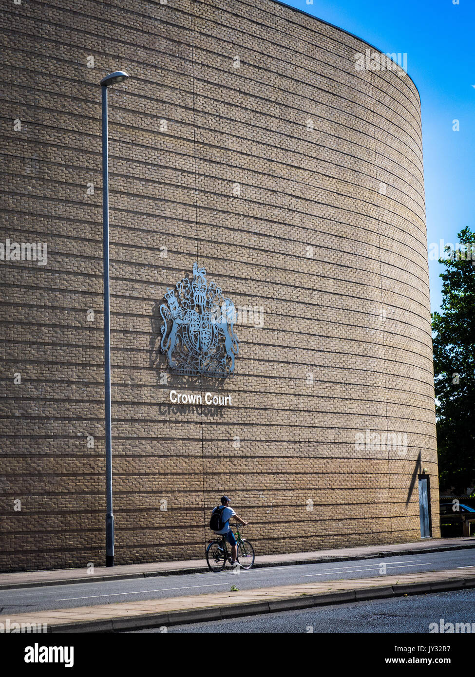 Cambridge Crown Court - a cyclists passes Cambridge Crown Court in East ...