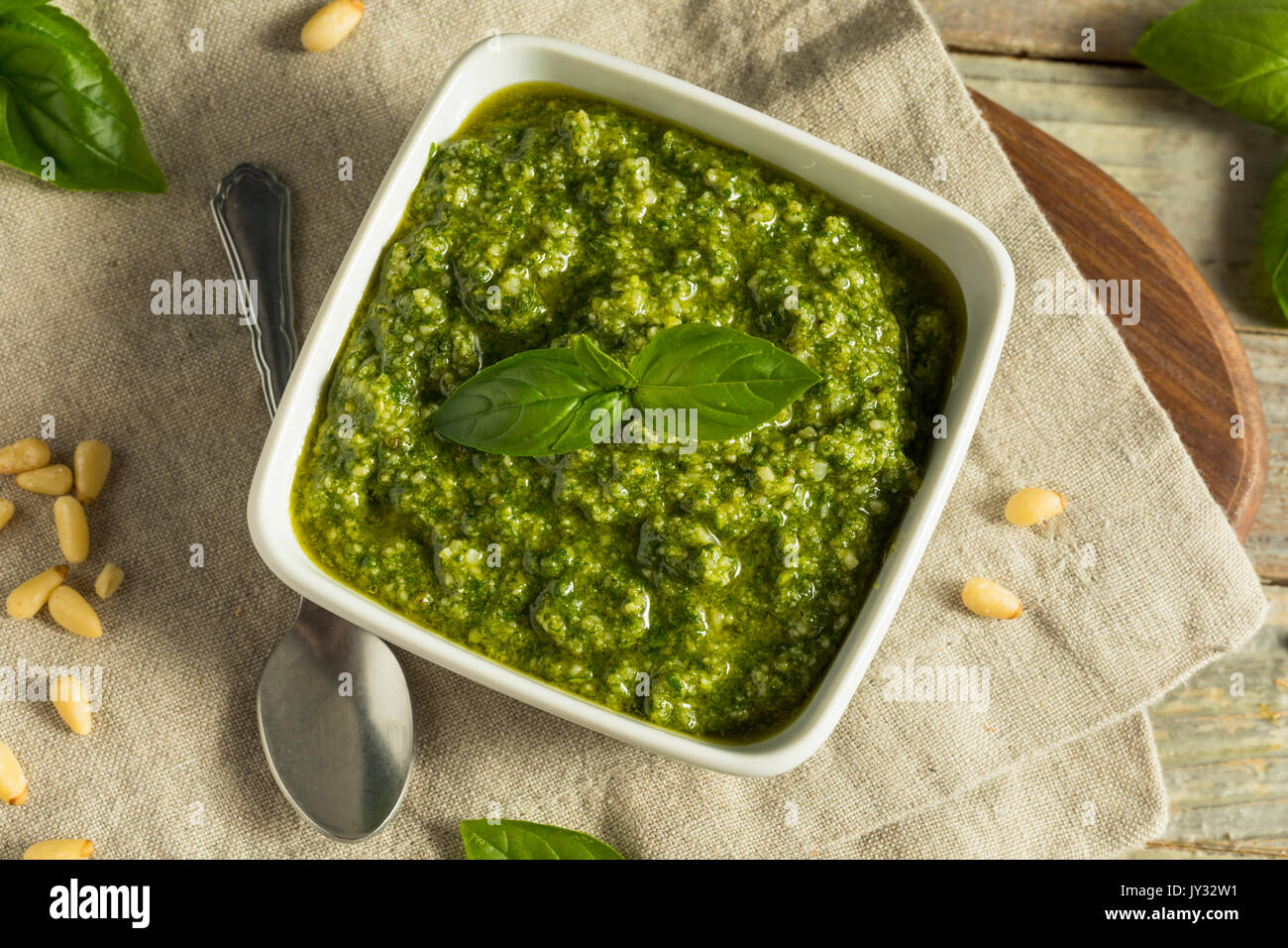 Homemade Italian Green Basil Pesto Sauce with Pine Nuts Stock Photo - Alamy