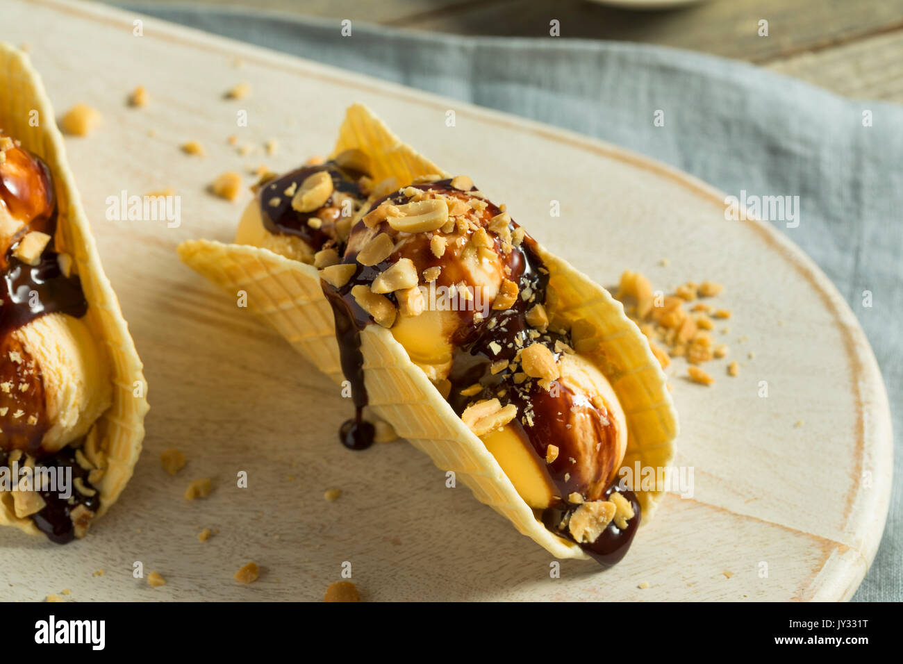 Sweet Homemade Chocolate Ice Cream Taco with Peanuts Stock Photo - Alamy