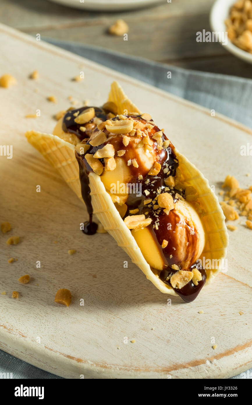 Sweet Homemade Chocolate Ice Cream Taco with Peanuts Stock Photo - Alamy