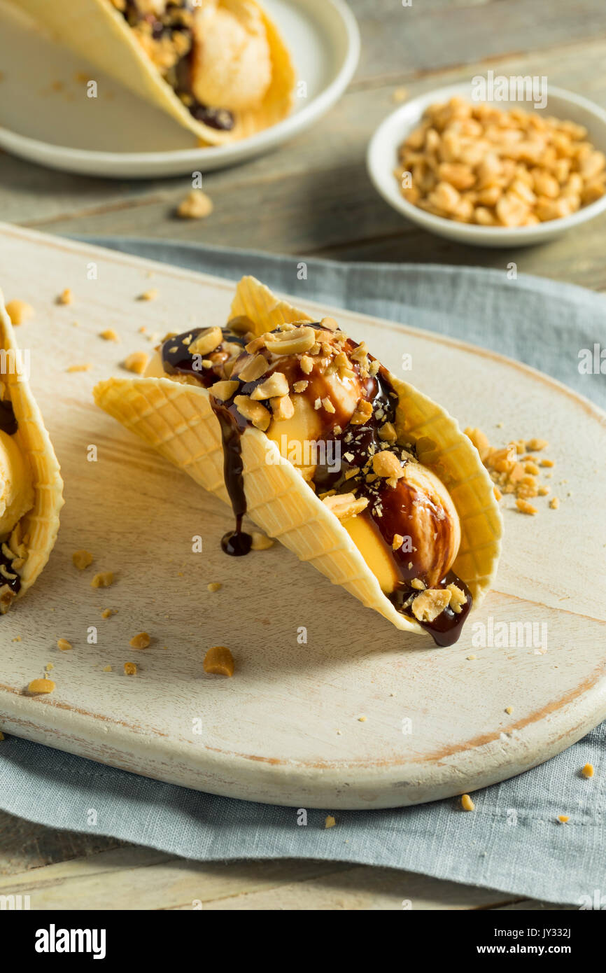 Sweet Homemade Chocolate Ice Cream Taco with Peanuts Stock Photo - Alamy