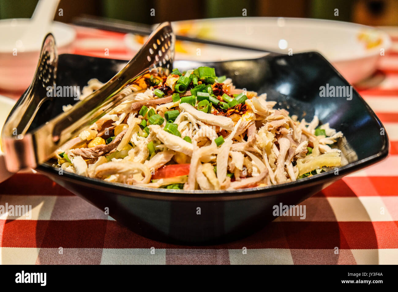 A dish of spicy and shredded chicken in a Chinese restaurant Stock ...