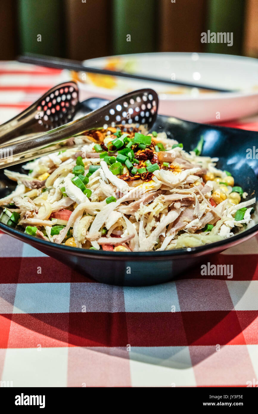 A dish of spicy and shredded chicken in a Chinese restaurant Stock ...
