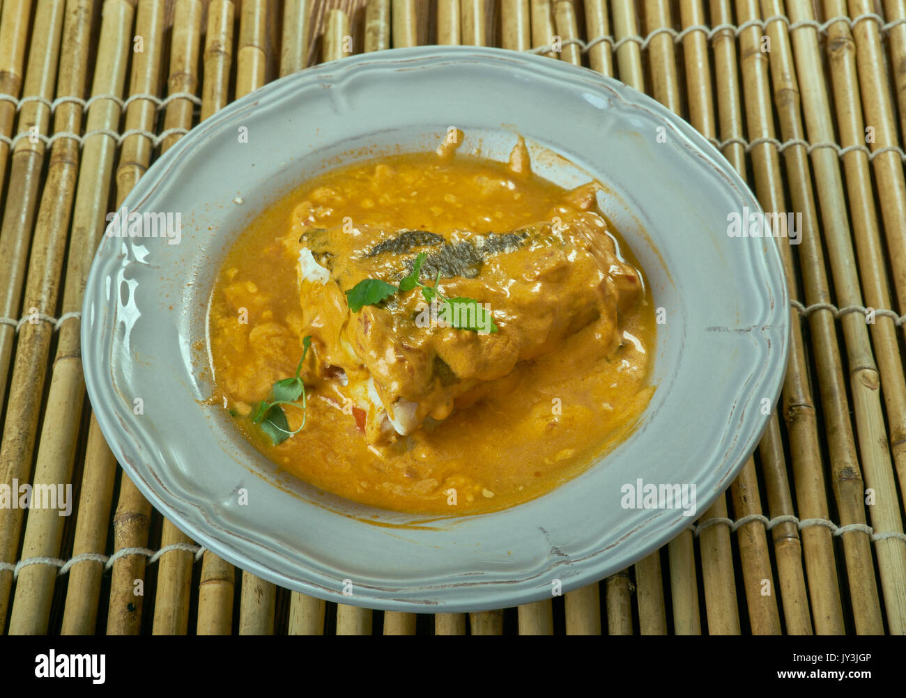 Macher Jhol - Bengali style fish cooked in hot mustard broth Stock ...