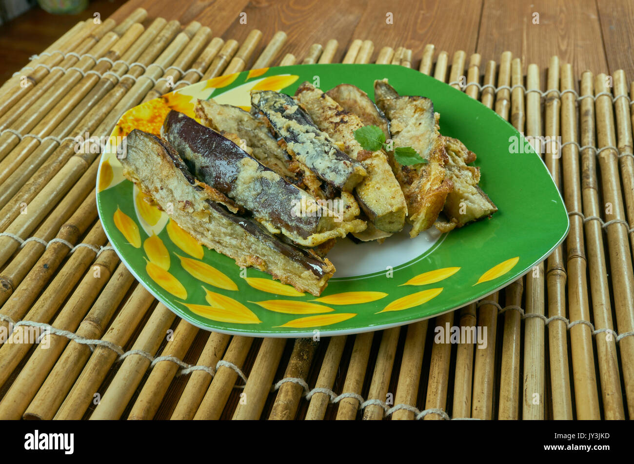 Beguni - Bengali snack made of eggplant, sliced and battered before ...