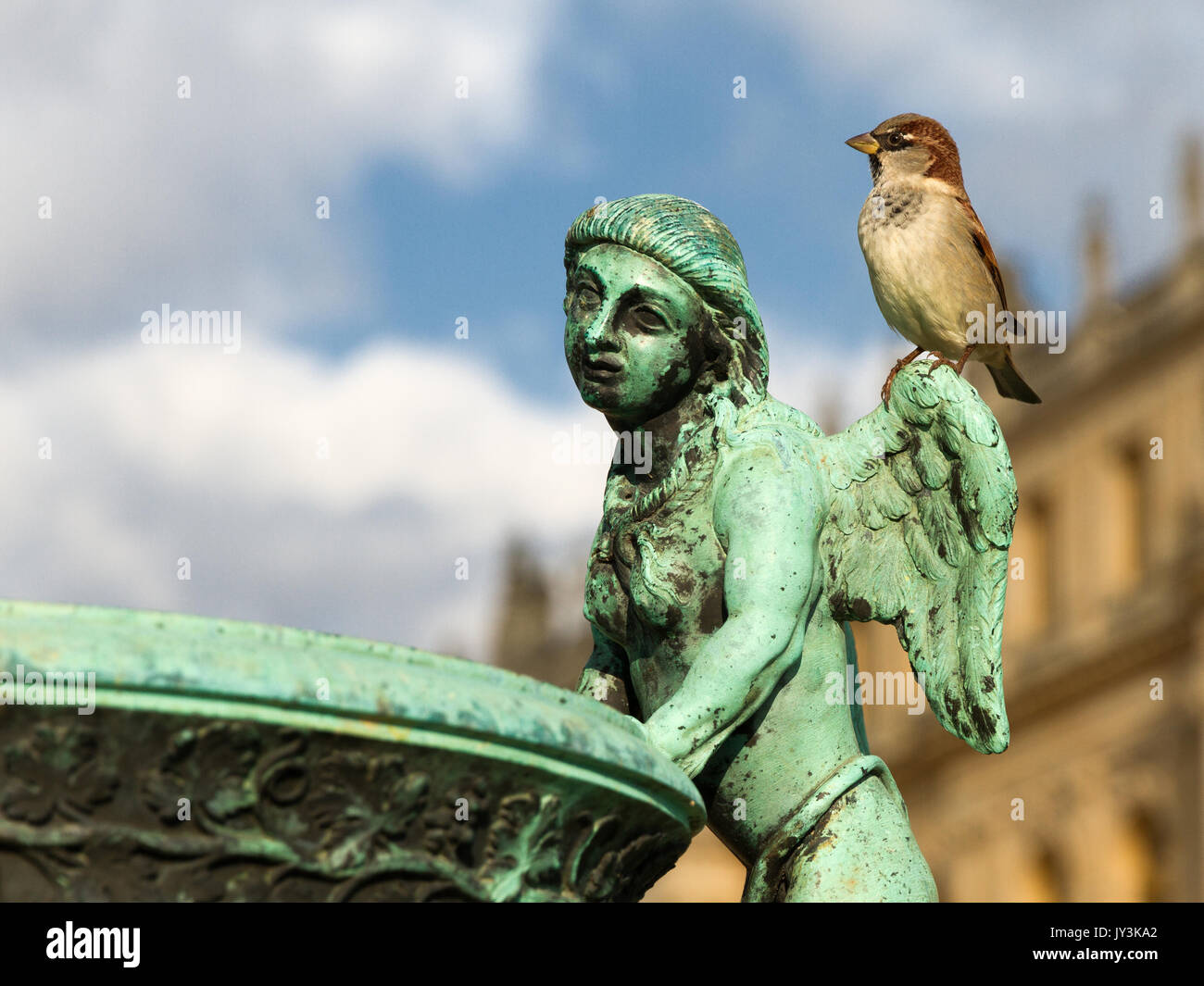 Old historical bronze sculpture of angel man in the Versailles palace ...